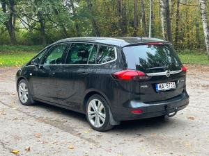 Black Opel Zafira 2014 in Riga, with an engine capacity of 1.60 L and mileage of 0 thousand km for 5199 €, photo 4 on AUTOMOTO.COM.LV