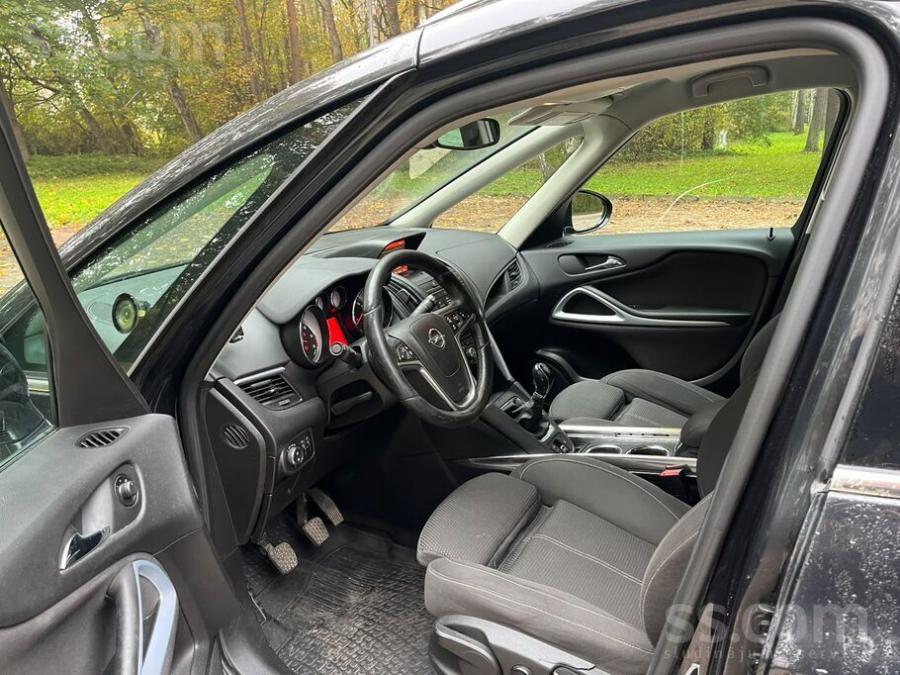Black Opel Zafira 2014 in Riga, with an engine capacity of 1.60 L and mileage of 0 thousand km for 5199 €, photo 10 on AUTOMOTO.COM.LV