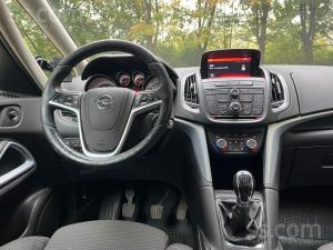 Black Opel Zafira 2014 in Riga, with an engine capacity of 1.60 L and mileage of 0 thousand km for 5199 €, photo 12 on AUTOMOTO.COM.LV
