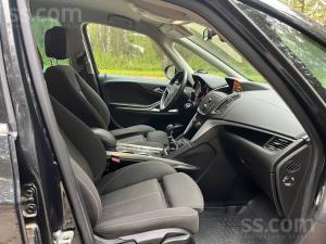 Black Opel Zafira 2014 in Riga, with an engine capacity of 1.60 L and mileage of 0 thousand km for 5199 €, photo 24 on AUTOMOTO.COM.LV