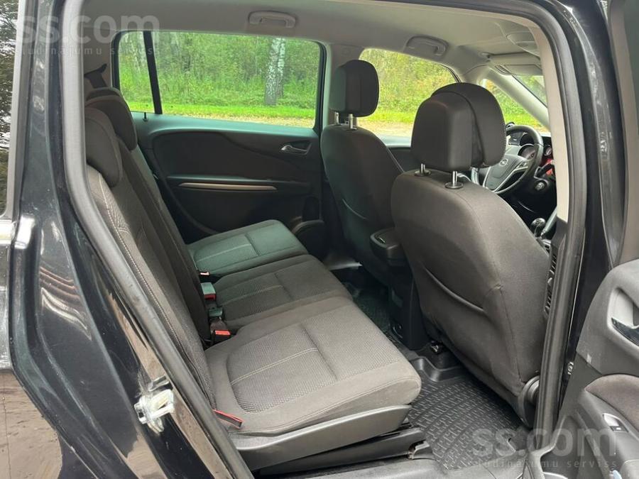 Black Opel Zafira 2014 in Riga, with an engine capacity of 1.60 L and mileage of 0 thousand km for 5199 €, photo 25 on AUTOMOTO.COM.LV