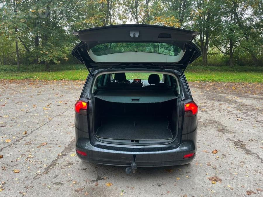 Black Opel Zafira 2014 in Riga, with an engine capacity of 1.60 L and mileage of 0 thousand km for 5199 €, photo 26 on AUTOMOTO.COM.LV