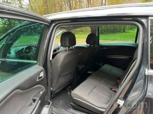 Black Opel Zafira 2014 in Riga, with an engine capacity of 1.60 L and mileage of 0 thousand km for 5199 €, photo 27 on AUTOMOTO.COM.LV