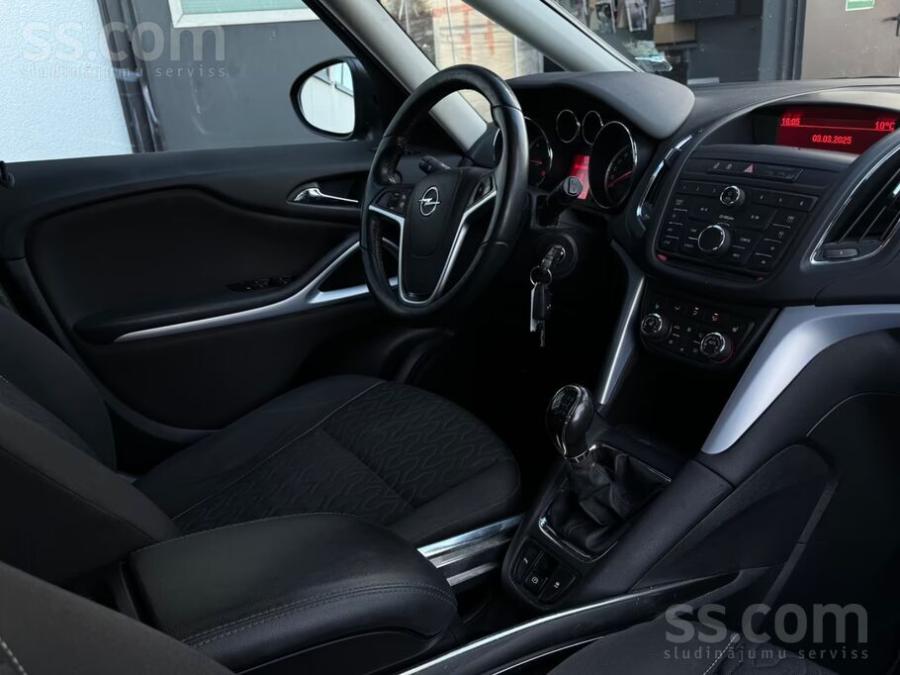 Black Opel Zafira 2015 in Ogre, with an engine capacity of 2.00 L and mileage of 217 thousand km for 6699 €, photo 8 on AUTOMOTO.COM.LV