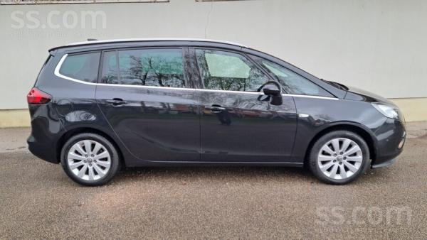 Black Opel Zafira 2016 in Ogre, with an engine capacity of 1.40 L and mileage of 103 thousand km for 8650 €, photo 6 on AUTOMOTO.COM.LV
