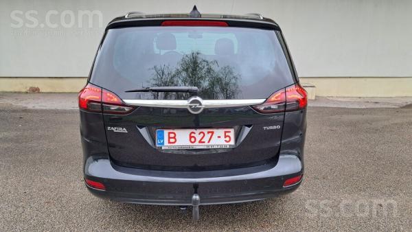 Black Opel Zafira 2016 in Ogre, with an engine capacity of 1.40 L and mileage of 103 thousand km for 8650 €, photo 8 on AUTOMOTO.COM.LV