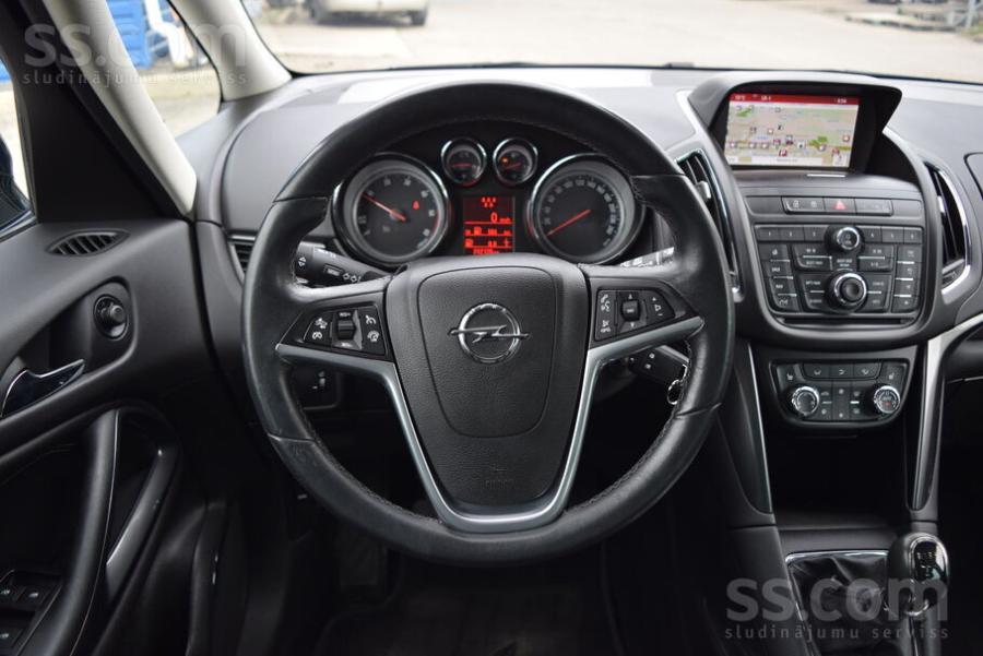 Black Opel Zafira 2016 in Riga, with an engine capacity of 1.60 L and mileage of 242 thousand km for 6500 €, photo 12 on AUTOMOTO.COM.LV