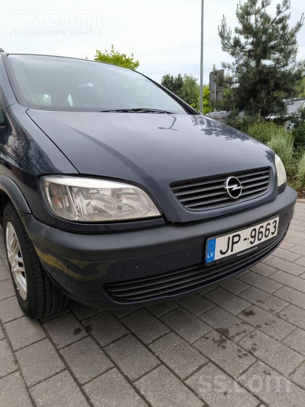 Zils Opel Zafira 1999 Rīga, ar dzinēja tilpumu 2.00 L un nobraukumu 297 tūkst. km par 1250 €, foto 7 vietnē AUTOMOTO.COM.LV