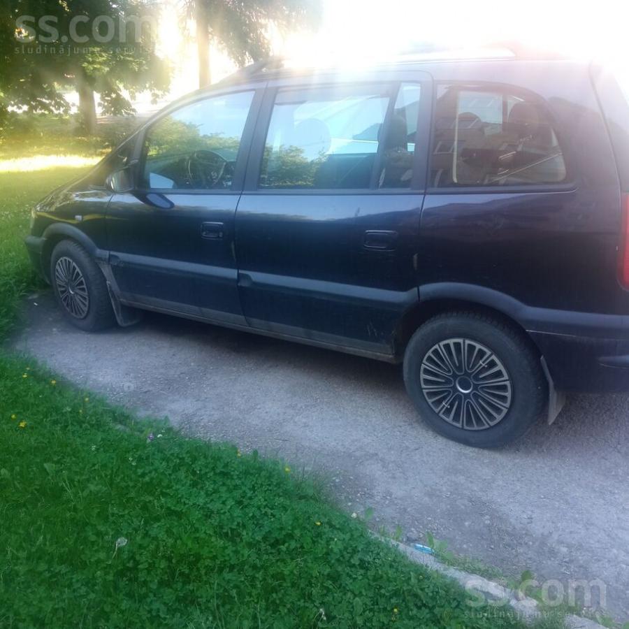 Zils Opel Zafira 2003 Jēkabpils, ar dzinēja tilpumu 1.80 L un nobraukumu 350 tūkst. km par 1100 €, foto 7 vietnē AUTOMOTO.COM.LV