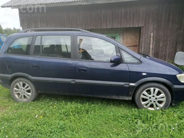 Zils Opel Zafira 2003 Rēzekne, ar dzinēja tilpumu 2.00 L un nobraukumu 300 tūkst. km par 1100 €, foto 5 vietnē AUTOMOTO.COM.LV