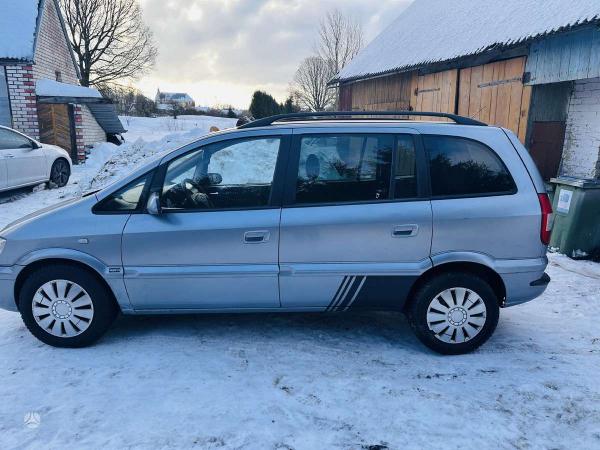 Blue Opel Zafira 2004 in Raseiniai, with an engine capacity of 2.00 L and mileage of 298 thousand km for 1100 €, photo 7 on AUTOMOTO.COM.LV
