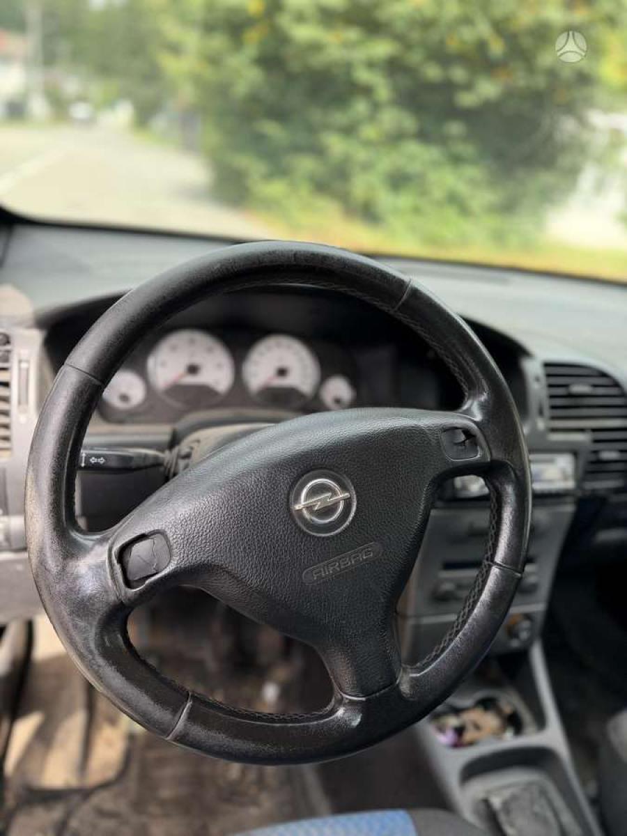 Zils Opel Zafira 2004 Kauņa, ar dzinēja tilpumu 2.00 L un nobraukumu 362 tūkst. km par 550 €, foto 18 vietnē AUTOMOTO.COM.LV