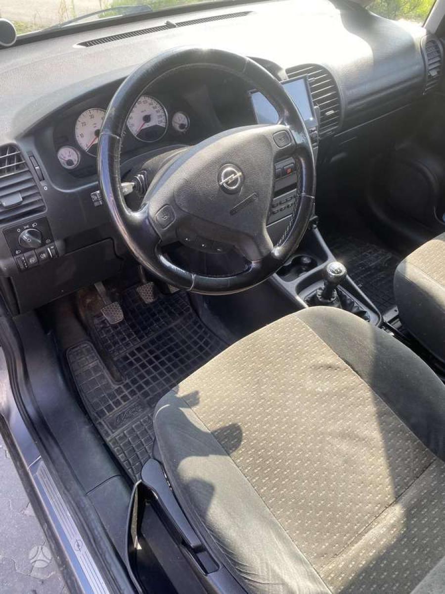 Blue Opel Zafira 2005 in Vilnius, with an engine capacity of 2.17 L and mileage of 300 thousand km for 950 €, photo 5 on AUTOMOTO.COM.LV