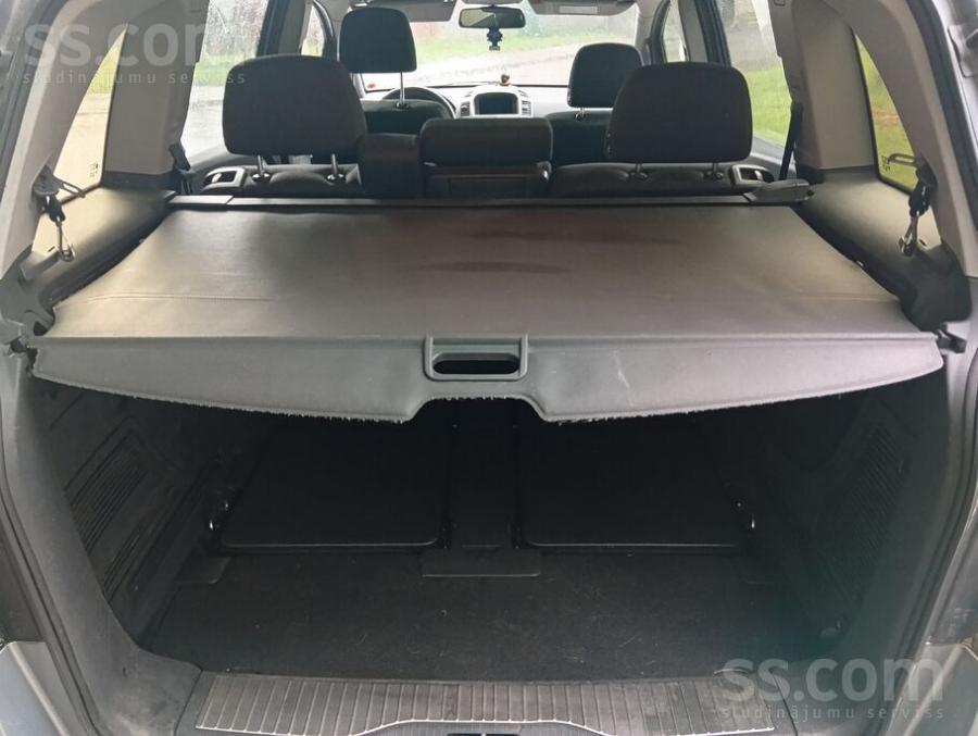 Zils Opel Zafira 2006 Rīga, ar dzinēja tilpumu 1.90 L un nobraukumu 308 tūkst. km par 1050 €, foto 13 vietnē AUTOMOTO.COM.LV