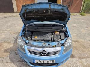 Blue Opel Zafira 2006 in Kaunas, with an engine capacity of 1.91 L and mileage of 315 thousand km for 990 €, photo 12 on AUTOMOTO.COM.LV