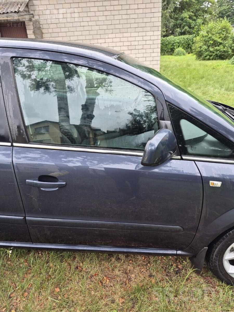 Zils Opel Zafira 2011 Rīga, ar dzinēja tilpumu 1.70 L un nobraukumu 341 tūkst. km par 2600 €, foto 5 vietnē AUTOMOTO.COM.LV