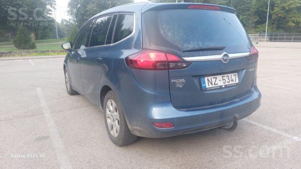 Opel Zafira 2013 in Ogre on AUTOMOTO.COM.LV Blue Opel Zafira 2013 in Ogre, with an engine capacity of 1.60 L and mileage of 321 thousand km for 5100 β¬, photo 5 on AUTOMOTO.COM.LV