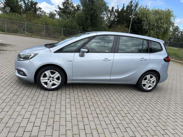 Blue Opel Zafira 2017 in Marijampole, with an engine capacity of 1.60 L and mileage of 217 thousand km for 7250 €, photo 2 on AUTOMOTO.COM.LV