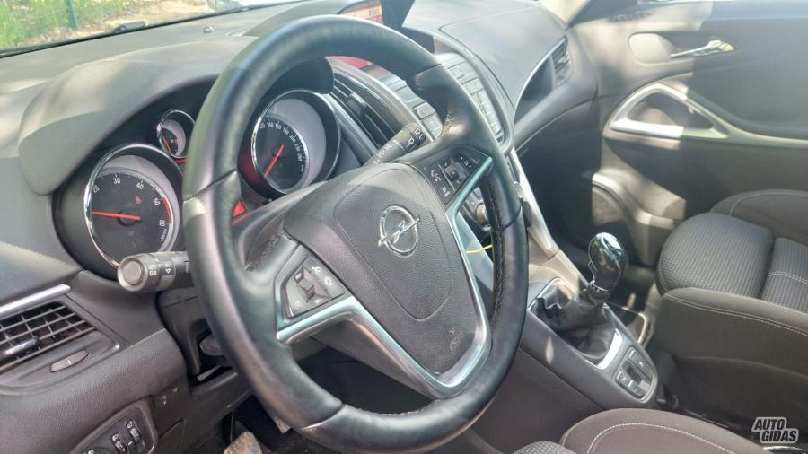 Blue Opel Zafira 2013 in Kaunas, with an engine capacity of 2.00 L and mileage of 239 thousand km for 4700 €, photo 16 on AUTOMOTO.COM.LV