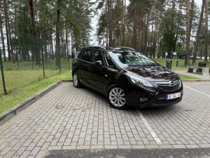 Brown Opel Zafira 2012 in Riga, with an engine capacity of 2.00 L and mileage of 243 thousand km for 2900 €, photo 3 on AUTOMOTO.COM.LV