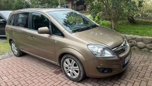 Brown Opel Zafira 2013 in Vilnius, with an engine capacity of 1.91 L and mileage of 300 thousand km for 2950 €, photo  on AUTOMOTO.COM.LV