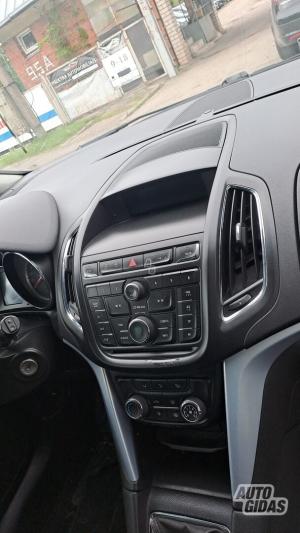 Brown Opel Zafira 2015 in Vilnius, with an engine capacity of 2.00 L and mileage of 237 thousand km for 5500 €, photo 14 on AUTOMOTO.COM.LV