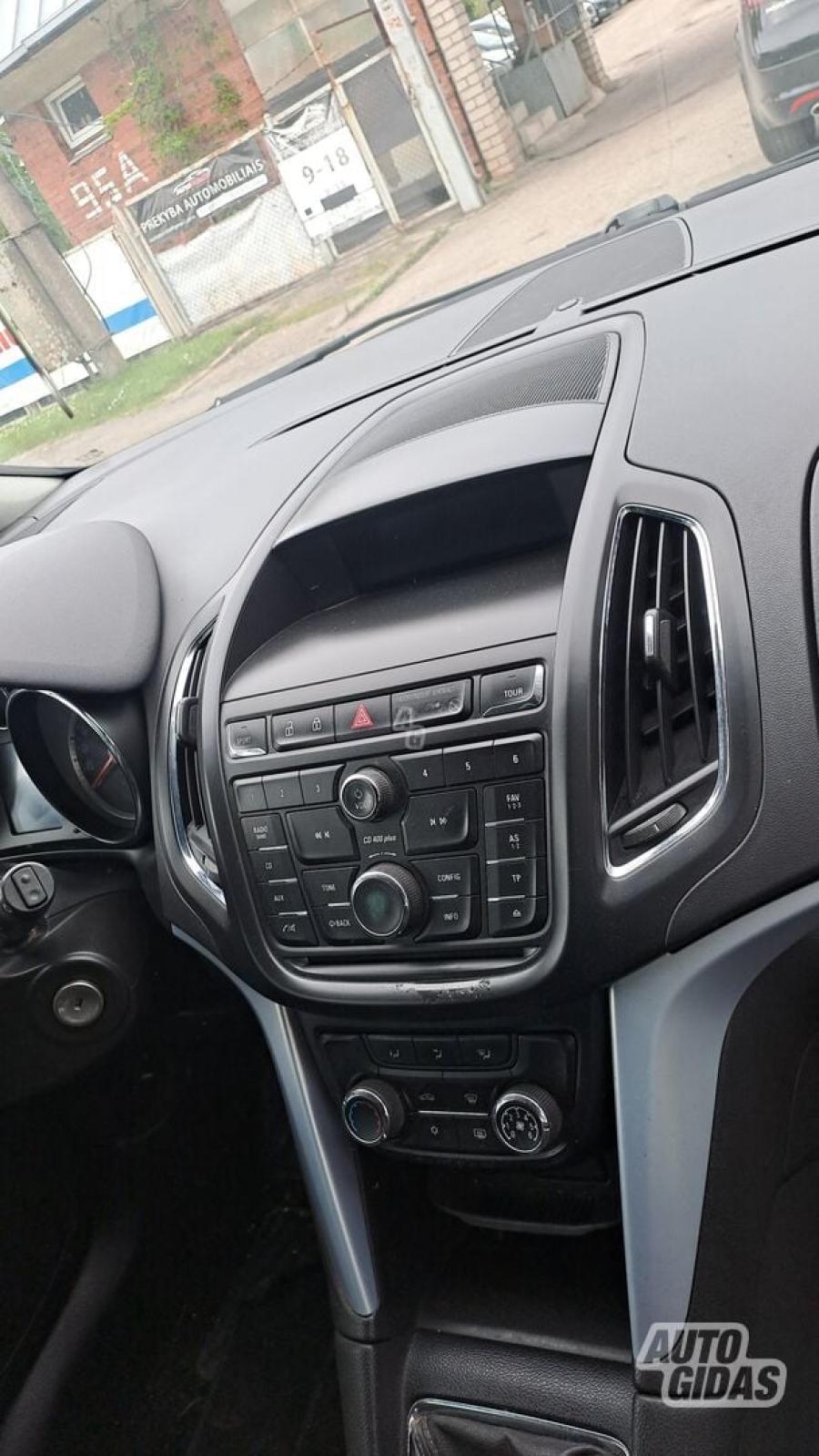 Brown Opel Zafira 2015 in Vilnius, with an engine capacity of 2.00 L and mileage of 237 thousand km for 5500 €, photo 14 on AUTOMOTO.COM.LV