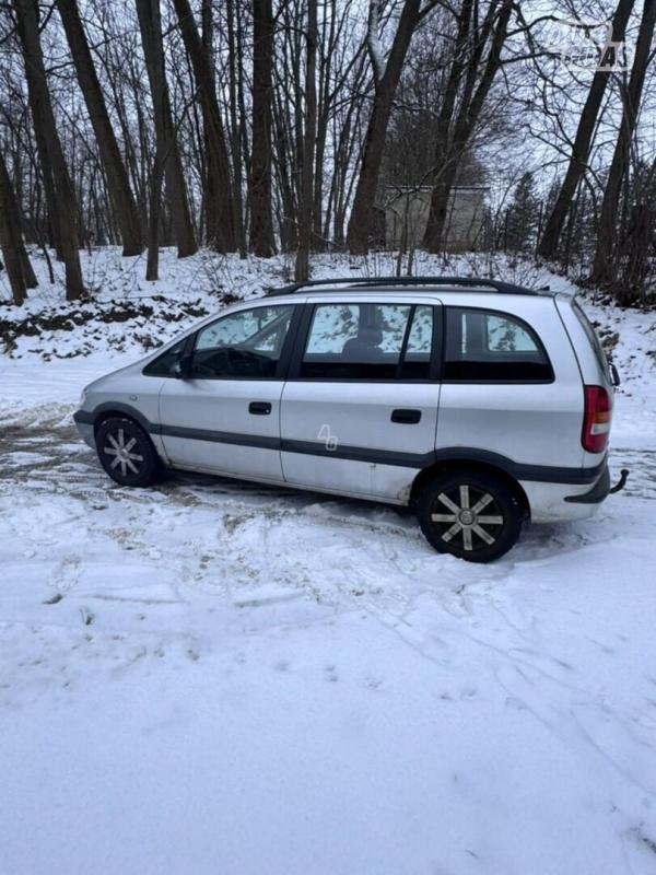 Pelēks Opel Zafira 2002 Alīta, ar dzinēja tilpumu 2.00 L un nobraukumu 197 tūkst. km par 1000 €, foto 3 vietnē AUTOMOTO.COM.LV
