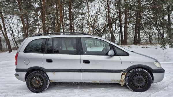 Pelēks Opel Zafira 2003 Viļņa, ar dzinēja tilpumu 2.20 L un nobraukumu 400 tūkst. km par 450 €, foto 5 vietnē AUTOMOTO.COM.LV