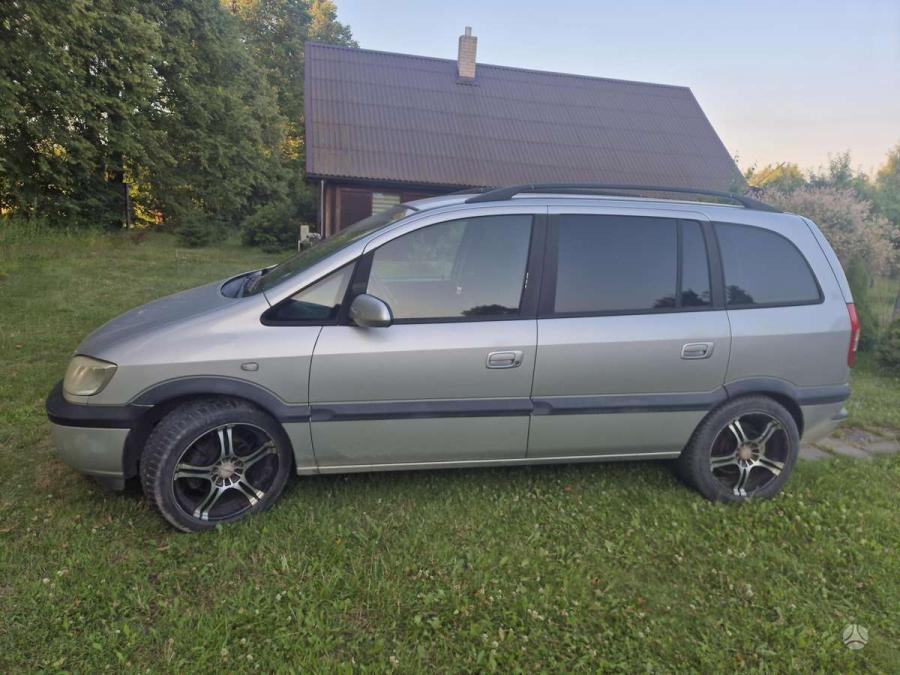 Grey Opel Zafira 2003 in Alytus, with an engine capacity of 2.00 L and mileage of 311 thousand km for 650 €, photo 1 on AUTOMOTO.COM.LV