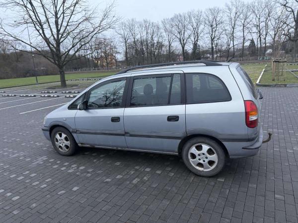 Grey Opel Zafira 2004 in Kaunas, with an engine capacity of 2.00 L and mileage of 310 thousand km for 660 €, photo 6 on AUTOMOTO.COM.LV