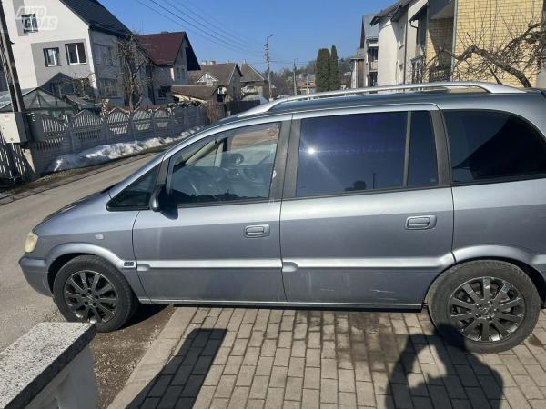 Pelēks Opel Zafira 2004 Panevēža, ar dzinēja tilpumu 2.00 L un nobraukumu 314 tūkst. km par 800 €, foto 2 vietnē AUTOMOTO.COM.LV