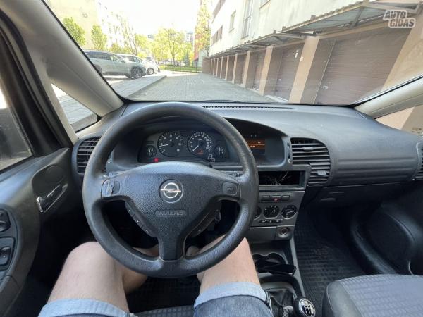 Pelēks Opel Zafira 2004 Viļņa, ar dzinēja tilpumu 2.00 L un nobraukumu 309 tūkst. km par 1200 €, foto 9 vietnē AUTOMOTO.COM.LV