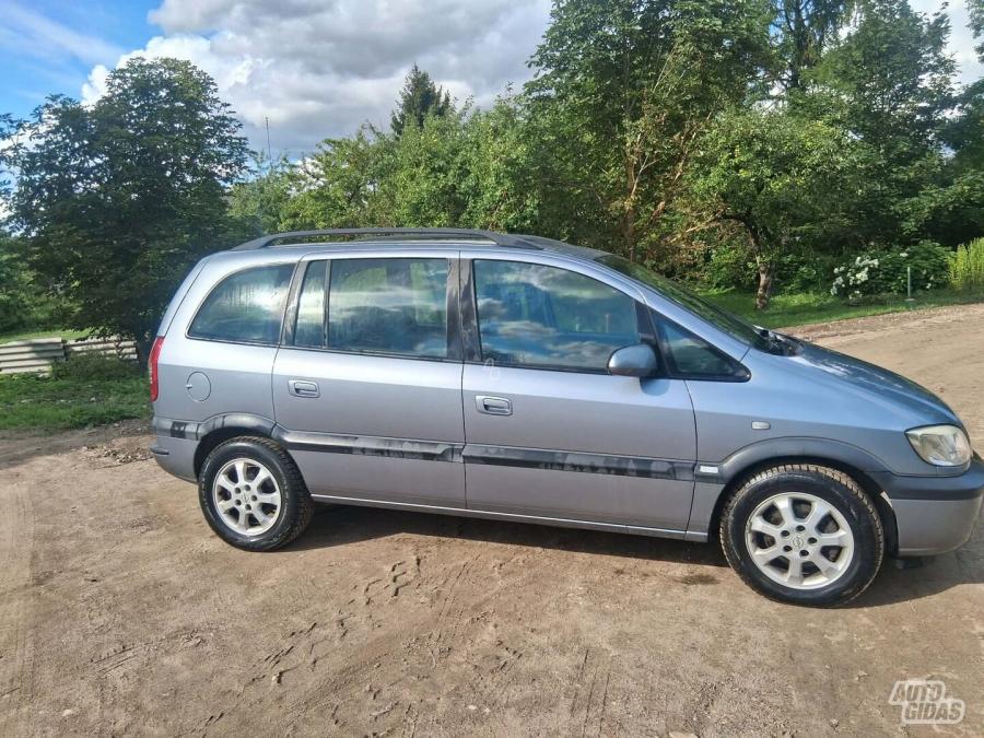 Pelēks Opel Zafira 2004 Naujoji Akmenė, ar dzinēja tilpumu 2.00 L un nobraukumu 260 tūkst. km par 950 €, foto 5 vietnē AUTOMOTO.COM.LV