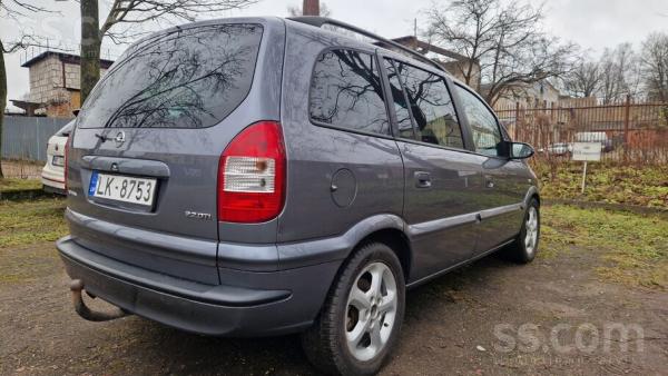Grey Opel Zafira 2005 in Riga, with an engine capacity of 2.20 L and mileage of 302 thousand km for 1550 €, photo 3 on AUTOMOTO.COM.LV