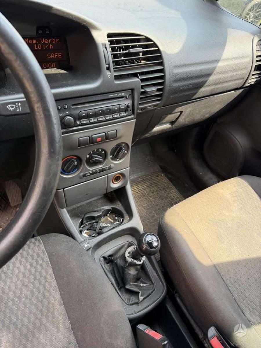 Grey Opel Zafira 2005 in Kaunas, with an engine capacity of 1.80 L and mileage of 285 thousand km for 499 €, photo 8 on AUTOMOTO.COM.LV