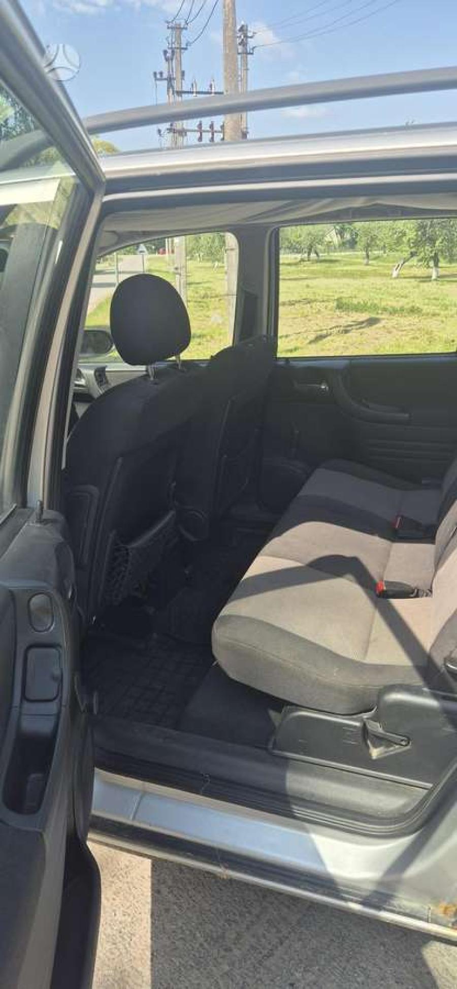 Grey Opel Zafira 2005 in Vilnius, with an engine capacity of 2.20 L and mileage of 196 thousand km for 1450 €, photo 12 on AUTOMOTO.COM.LV