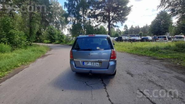 Pelēks Opel Zafira 2006 Rīga, ar dzinēja tilpumu 1.90 L un nobraukumu 304 tūkst. km par 700 €, foto 6 vietnē AUTOMOTO.COM.LV