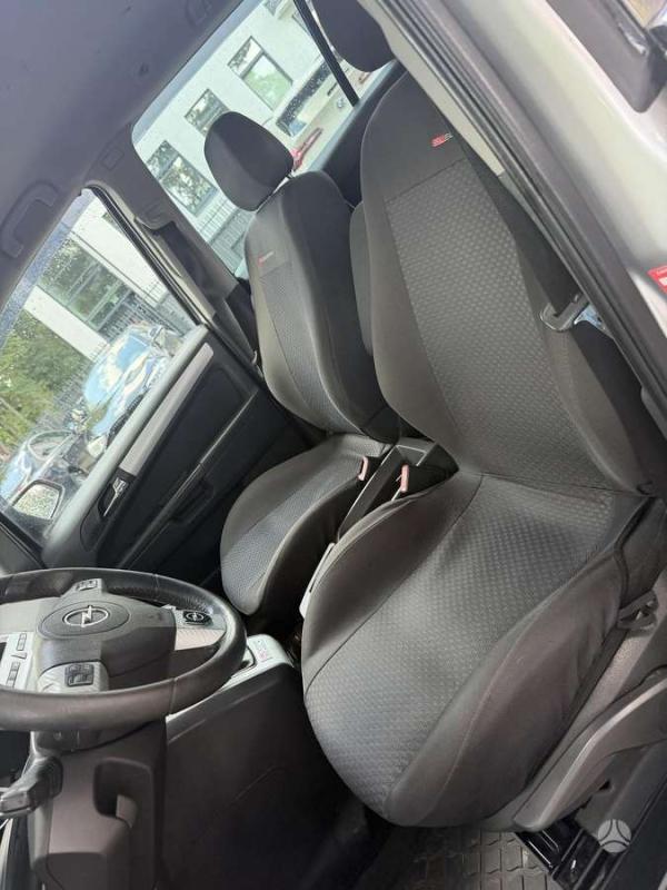 Grey Opel Zafira 2006 in Kaunas, with an engine capacity of 1.91 L and mileage of 260 thousand km for 1850 €, photo 11 on AUTOMOTO.COM.LV