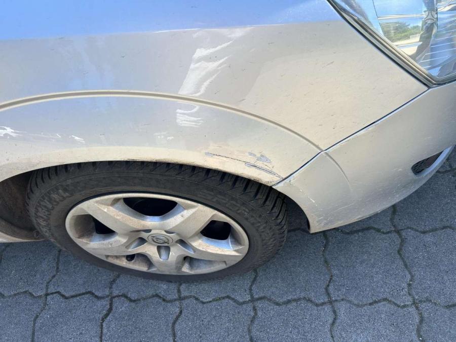 Grey Opel Zafira 2008 in Kaunas, with an engine capacity of 1.60 L and mileage of 218 thousand km for 1750 €, photo 12 on AUTOMOTO.COM.LV