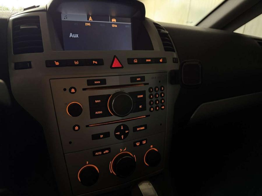 Grey Opel Zafira 2010 in Kaunas, with an engine capacity of 1.91 L and mileage of 396 thousand km for 2950 €, photo 17 on AUTOMOTO.COM.LV