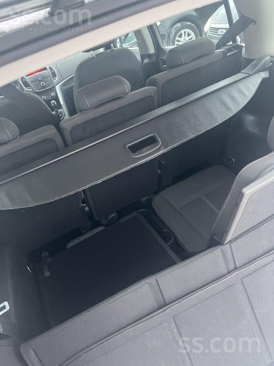 Grey Opel Zafira 2012 in Riga, with an engine capacity of 2.00 L and mileage of 0 thousand km for 5690 €, photo 12 on AUTOMOTO.COM.LV