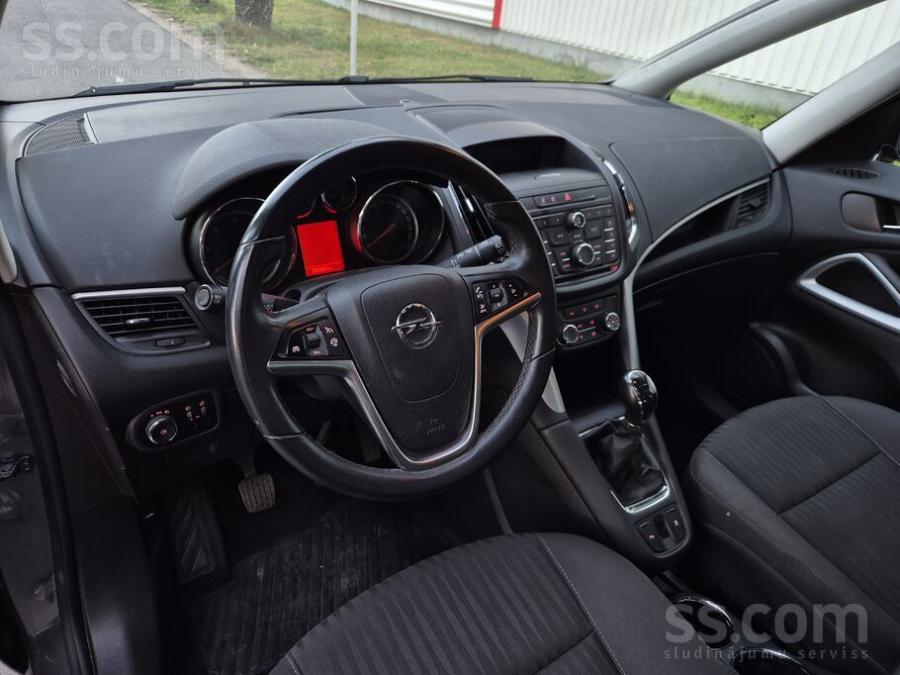 Grey Opel Zafira 2012 in Riga, with an engine capacity of 2.00 L and mileage of 0 thousand km for 4590 €, photo 20 on AUTOMOTO.COM.LV