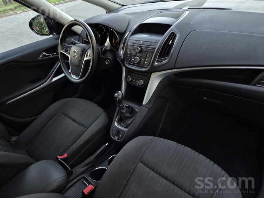 Grey Opel Zafira 2012 in Riga, with an engine capacity of 2.00 L and mileage of 0 thousand km for 4590 €, photo 21 on AUTOMOTO.COM.LV