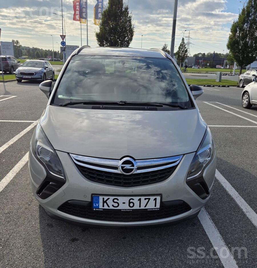 Grey Opel Zafira 2012 in Riga, with an engine capacity of 2.00 L and mileage of 291 thousand km for 3350 €, photo 3 on AUTOMOTO.COM.LV