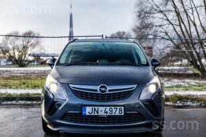 Grey Opel Zafira 2013 in Riga, with an engine capacity of 1.60 L and mileage of 303 thousand km for 6590 €, photo 3 on AUTOMOTO.COM.LV