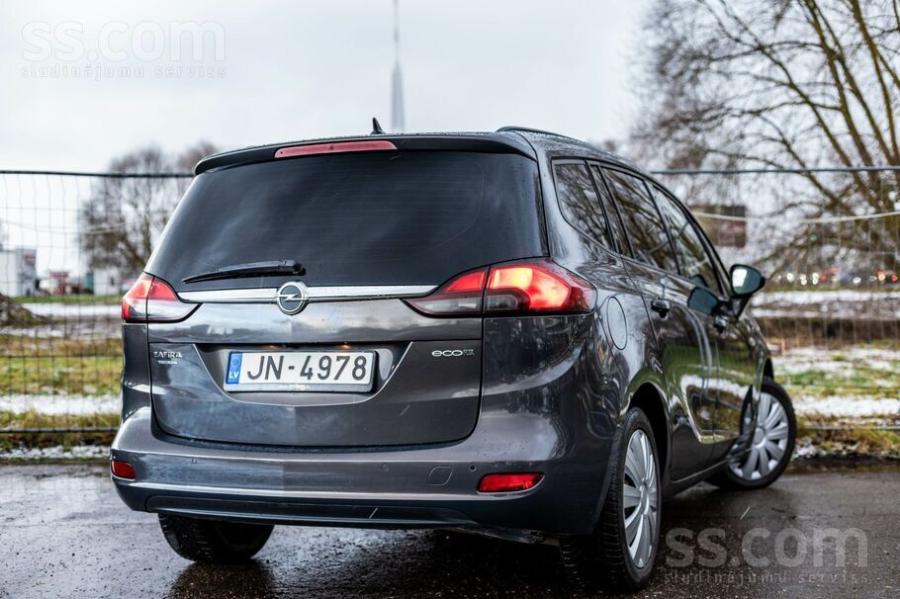 Grey Opel Zafira 2013 in Riga, with an engine capacity of 1.60 L and mileage of 303 thousand km for 6590 €, photo 7 on AUTOMOTO.COM.LV