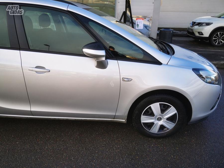 Grey Opel Zafira 2013 in Klaipeda, with an engine capacity of 2.00 L and mileage of 179 thousand km for 5990 €, photo 14 on AUTOMOTO.COM.LV