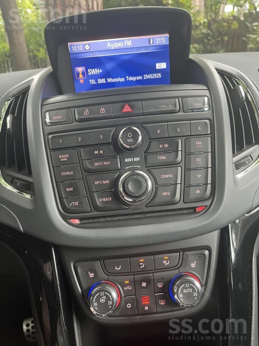 Grey Opel Zafira 2013 in Riga, with an engine capacity of 2.00 L and mileage of 238 thousand km for 6950 €, photo 10 on AUTOMOTO.COM.LV