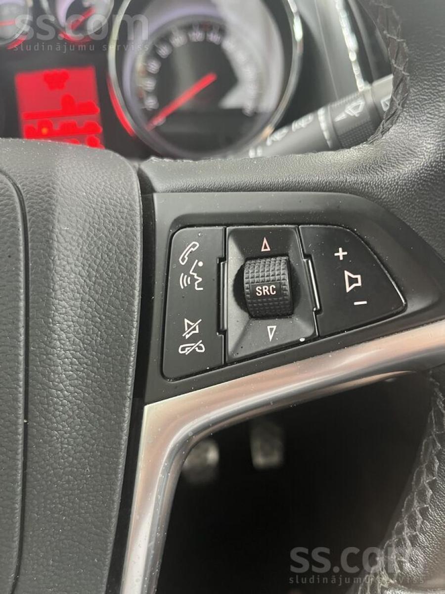 Grey Opel Zafira 2013 in Riga, with an engine capacity of 2.00 L and mileage of 238 thousand km for 6950 €, photo 12 on AUTOMOTO.COM.LV